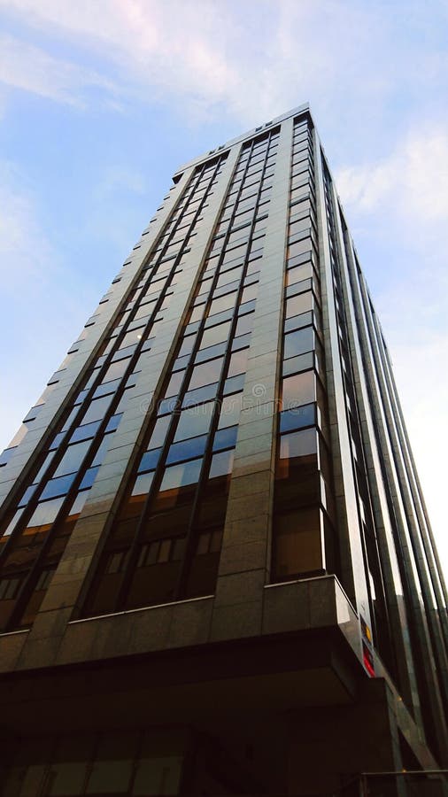 Modern Office Tower Block Suspended on Pillars Under Construction Stock ...
