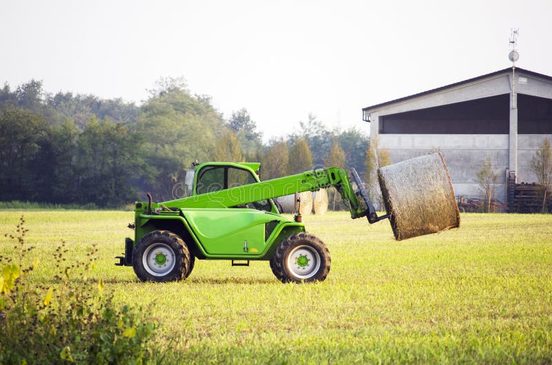 Modern Tractor Moving Hay Bales Stock Photos - Free & Royalty-Free ...