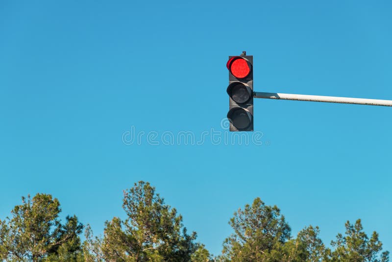 Modern Traffic Light with Red Light in Front of Cloudless Sunny Blue ...