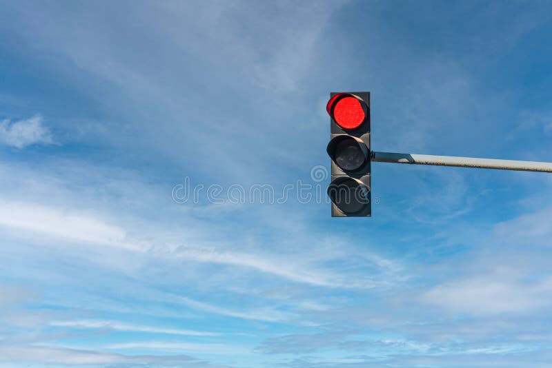 Modern Traffic Light with Red Light in Front of Cloudless Sunny Blue ...