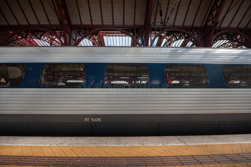 Modern Train Arriving at Historic Station.. Stock Photo - Image of ...