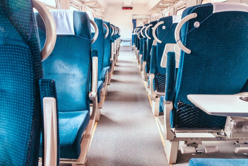 A Modern Train with Blue Empty Comfortable and Colorful Chairs. Stock ...