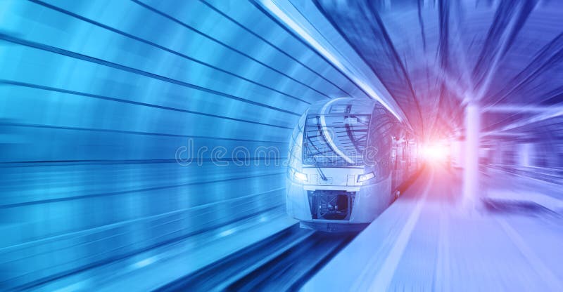 Modern Train on in the Illuminated Tunnel Rushes at High Speed with ...
