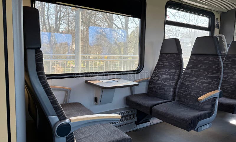 Modern Train Interior with Comfortable Seating and Large Windows Stock ...