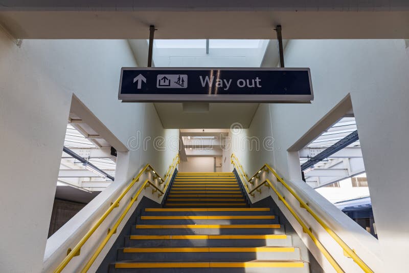 Modern Train Station Staircase with Clear Directional Signs for ...