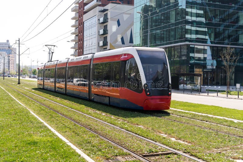 Modern Tram on the City Street Stock Image - Image of sidewalk ...