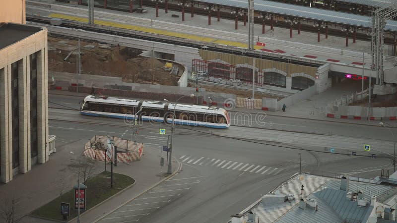One a Modern Tram Passes through an Intersection Alone, Top View Stock ...