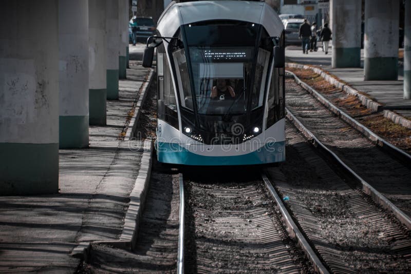Modern tram rides on stock image. Image of public, vehicle - 215767895
