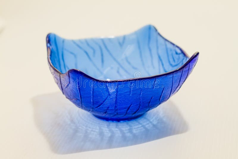 Modern Translucent Blue Glass Dish or Bowl Stock Photo - Image of ...