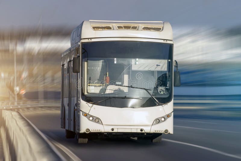 Modern Transport Bus on Asphalt Rides at High Speed, Front View. Stock ...