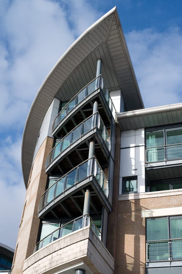 Modern Triangular Apartments with Metal and Glass Balconies Stock Photo ...