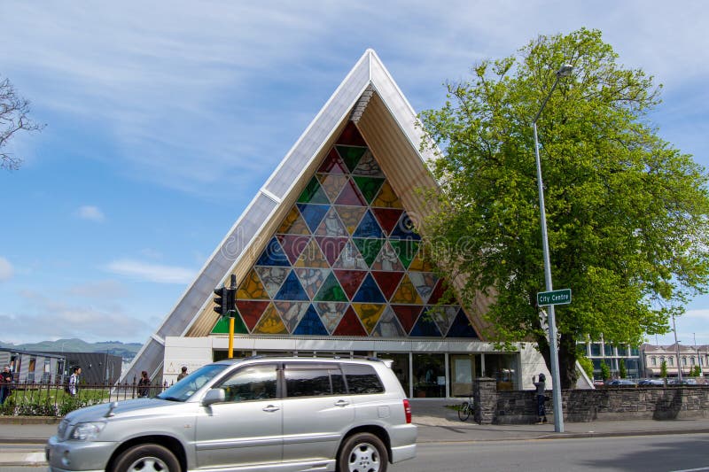 Colorful Triangular Building in Urban Setting Stock Image - Image of ...