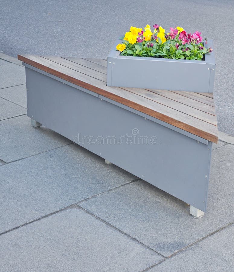 Modern Triangular Park Bench with Built-in Planter Box Stock Photo ...