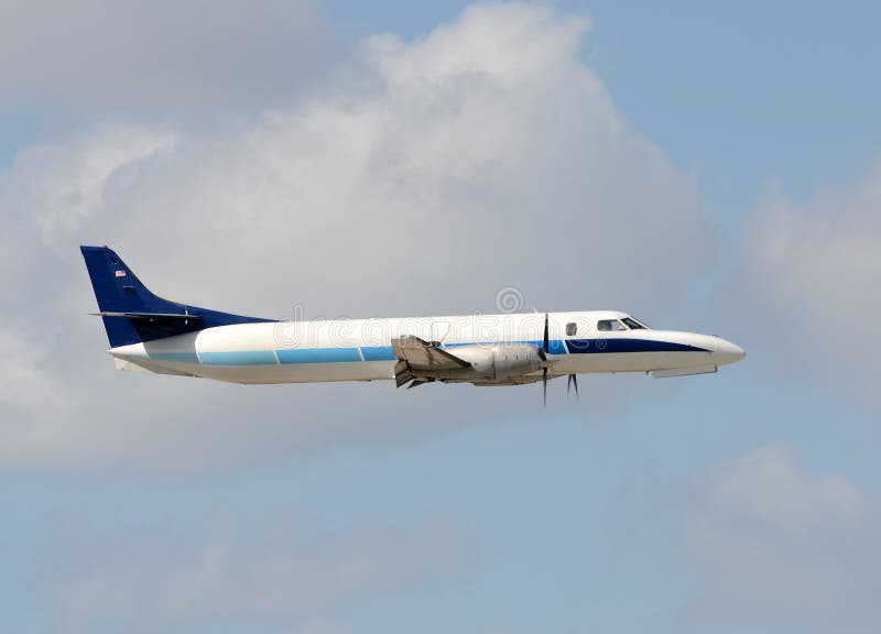 Modern turboprop airplane stock photo. Image of flying - 27112454