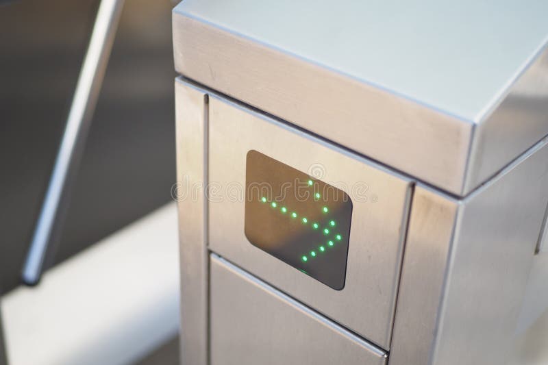 Modern Turnstile Gate with Green Arrow Indicator for Direction Control ...