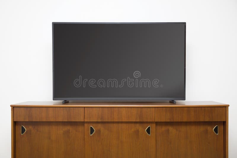Modern TV Set with Empty Blank Screen on the Wooden Cabinet Stock Photo ...