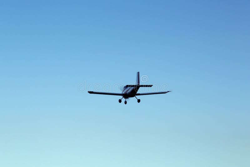 Modern Ultralight Airplane Flying in Blue Sky Stock Photo - Image of ...