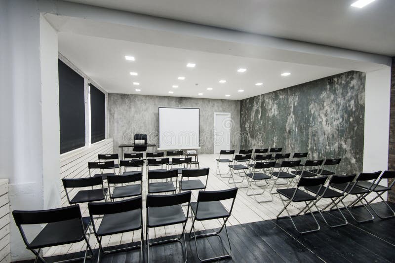 Modern University Group Study Room with White Desk and Chairs Stock ...
