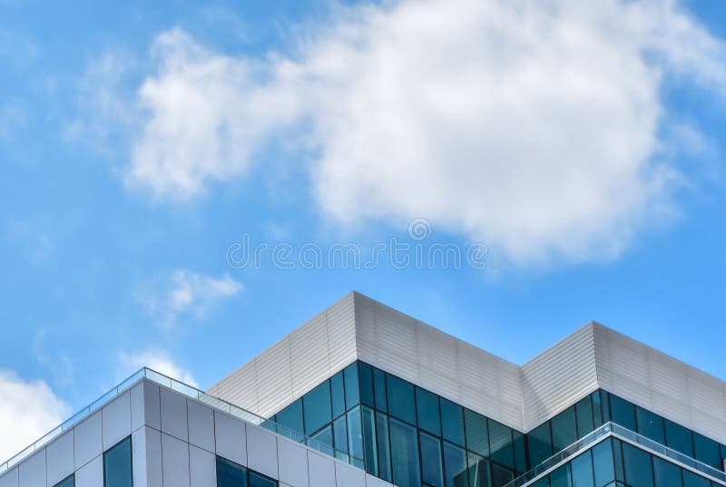 Modern Urban Architecture with Triangular Glass and Concrete Building ...