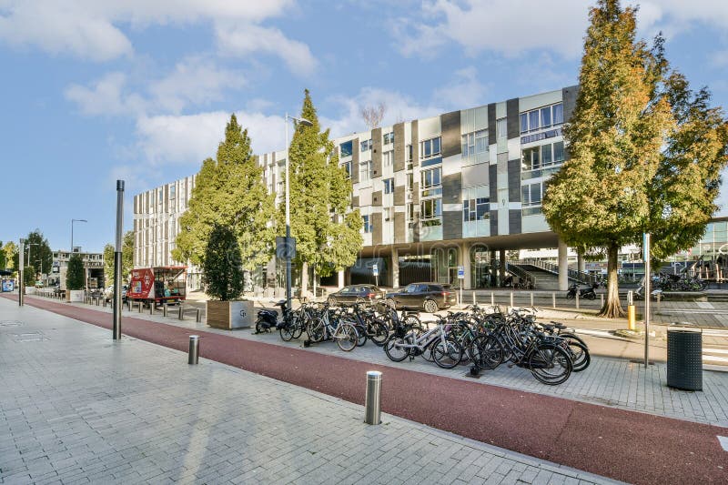 Modern Urban Building with Bicycle Parking Stock Photo - Image of ...