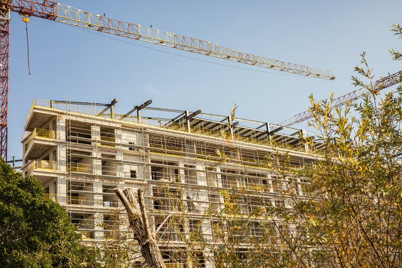 Modern Urban Construction Site with Crane and Scaffolding Stock Photo ...
