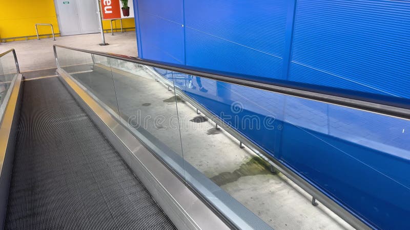 Modern Urban Escalator Perspective in Vibrant Interior Setting, Ikea ...