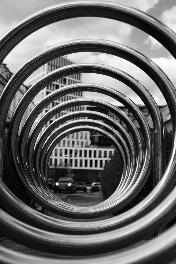 Modern Urban Scene of Interlocking Metal Rings Forming a Circular ...