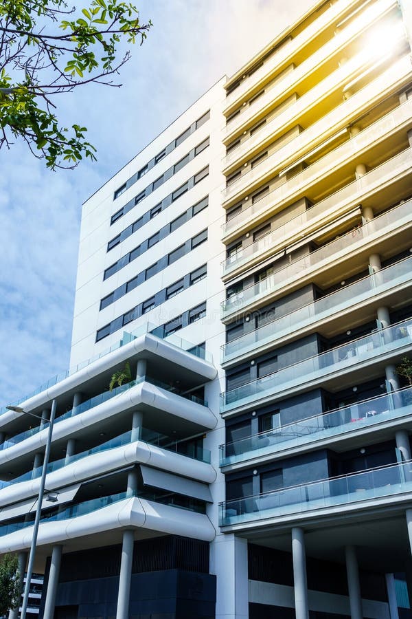 Modern Urban Tower Block Illuminated by Golden Sunlight Stock Image ...
