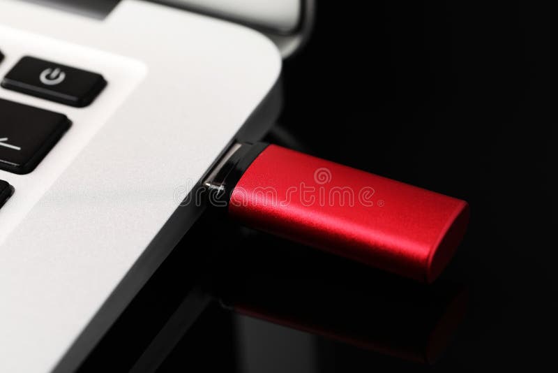 Modern Usb Flash Drive Attached into Laptop on Black Table, Closeup ...