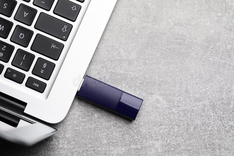 Modern Usb Flash Drive Attached into Laptop on Light Grey Table, Flat ...