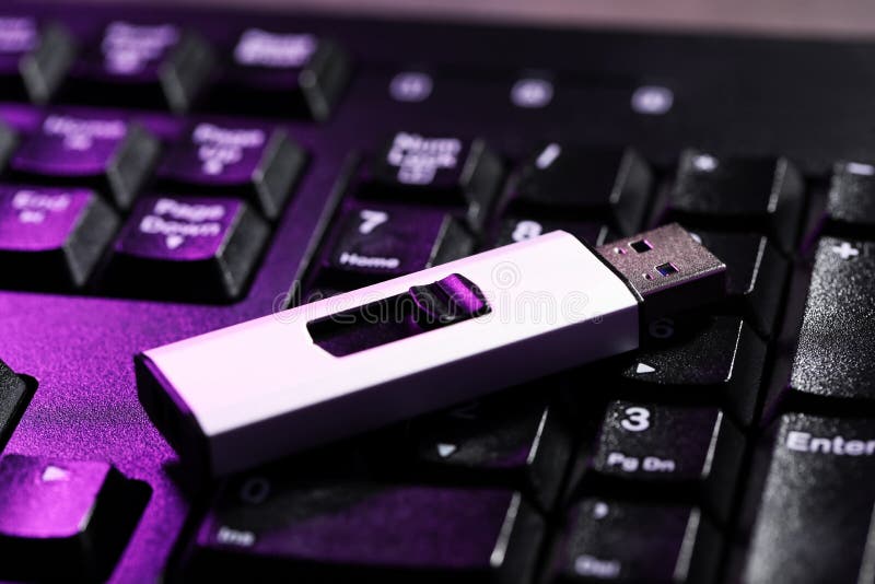 Modern Usb Flash Drive on Laptop Keyboard, Closeup Stock Image - Image ...