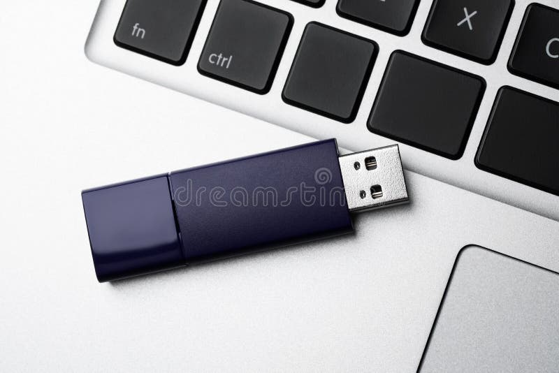 Modern Usb Flash Drive on Laptop, Top View Stock Photo - Image of ...