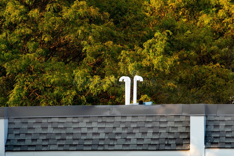 Exhaust pipes onthe roof stock image. Image of power - 197268287