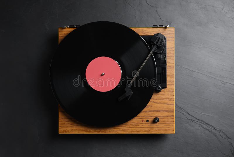 Modern Vinyl Record Player with Disc on Brown Background, Top View ...