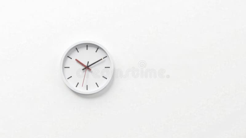 Modern Wall Clock Displaying Time on a Clean White Background ...