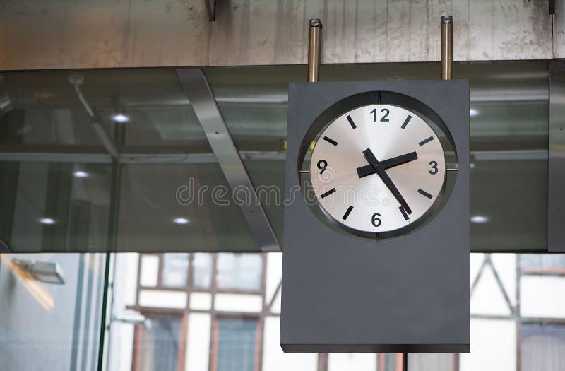 Modern Wall Clock Hanging Close To the Ceiling Stock Photo - Image of ...