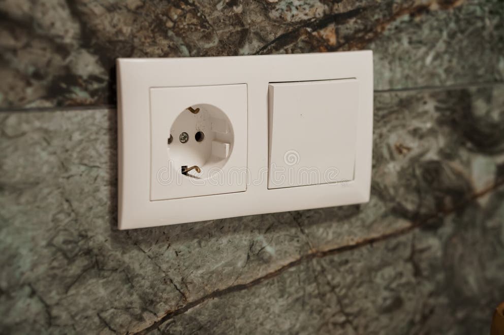 Modern Wall Electrical Outlet and Switch Panel on Marble Tile ...