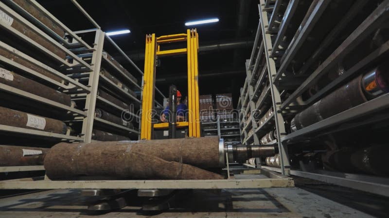 White Man Worker Pushing Stacker with Cylindrical Shaft in Warehouse ...