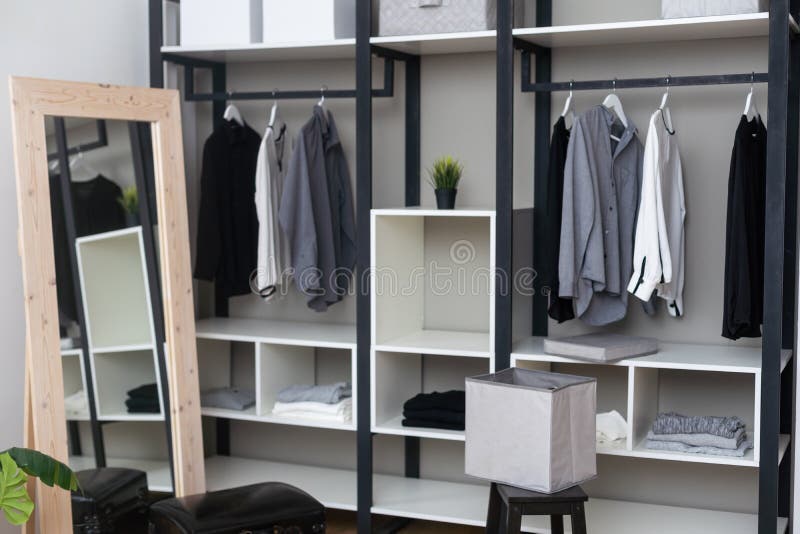 Modern Wardrobe with Stylish Clothes in Room Interior Stock Photo ...