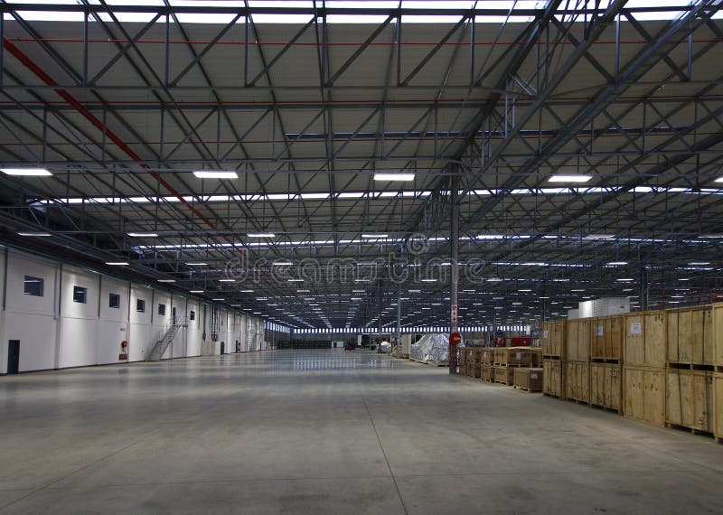 Modern warehouse interior stock photo. Image of lighting - 62400724