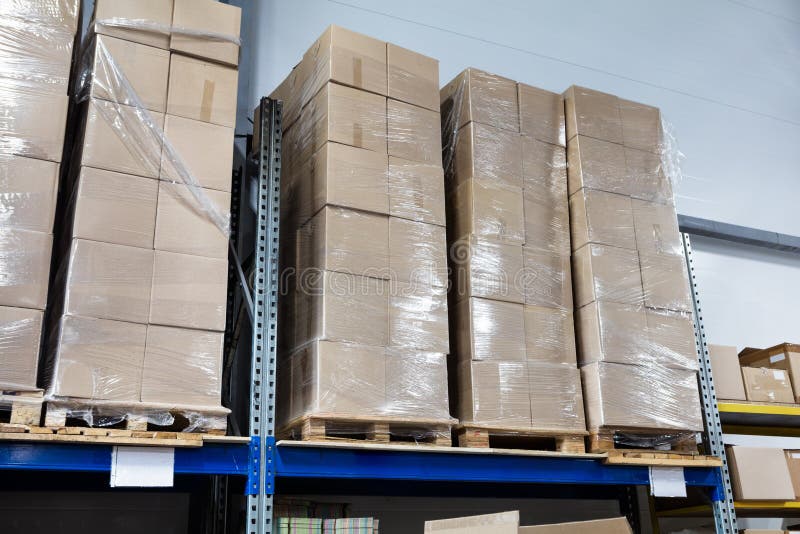 Warehouse of Products and Cardboard Stock Photo - Image of package ...