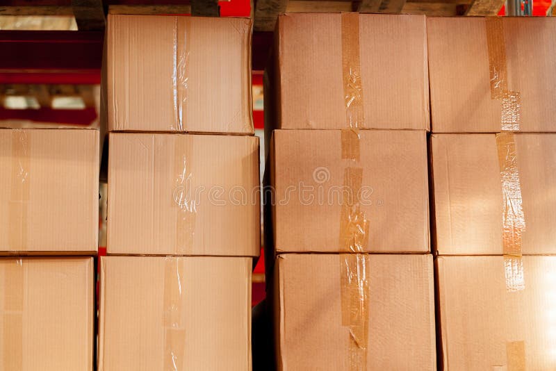 Modern Warehouse Shelves with Pile of Cardboard Boxes Stock Photo ...