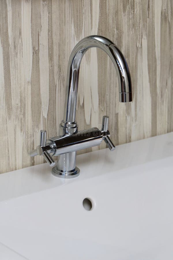 Modern washbasin tap stock image. Image of modern, faucet - 133928587
