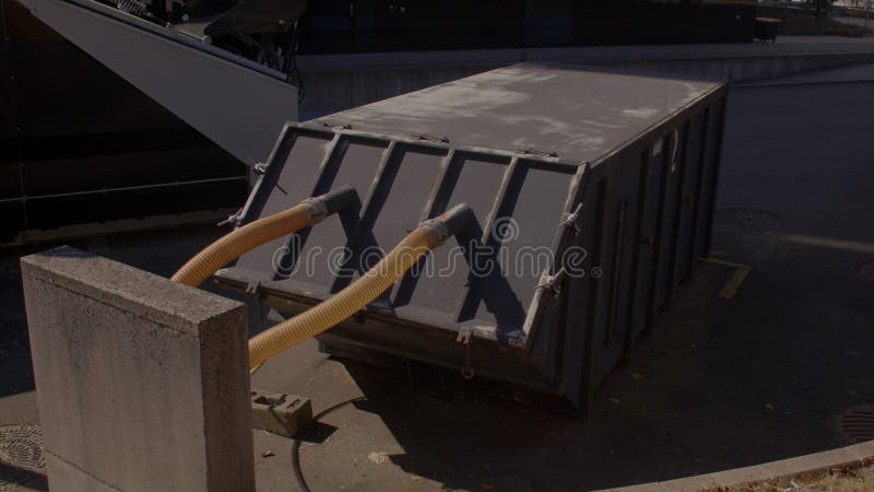 Modern Waste Container Connected To Hoses. Garbage Transportation ...