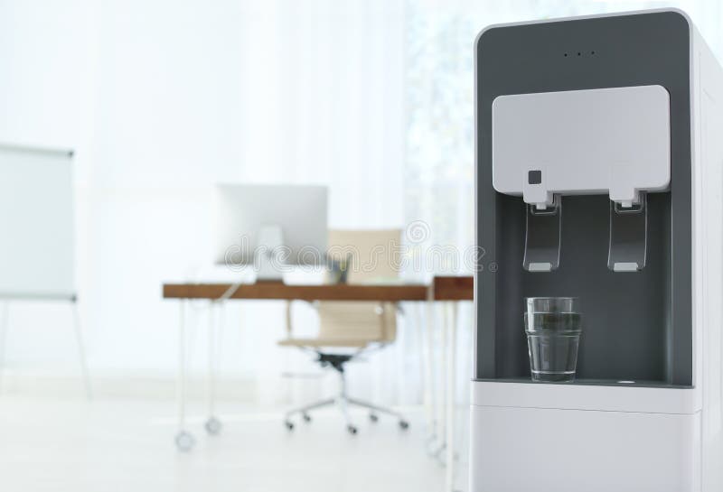 Modern Water Cooler with Glass in Office. Stock Image - Image of faucet ...