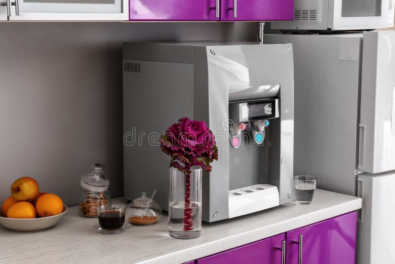 Modern Water Cooler on Table in Kitchen Stock Image - Image of counter ...