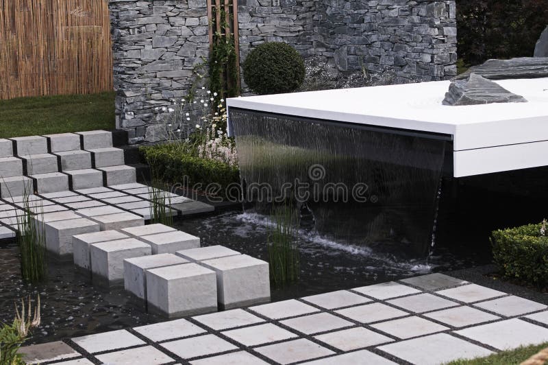 A modern water garden stock image. Image of feature - 258859117