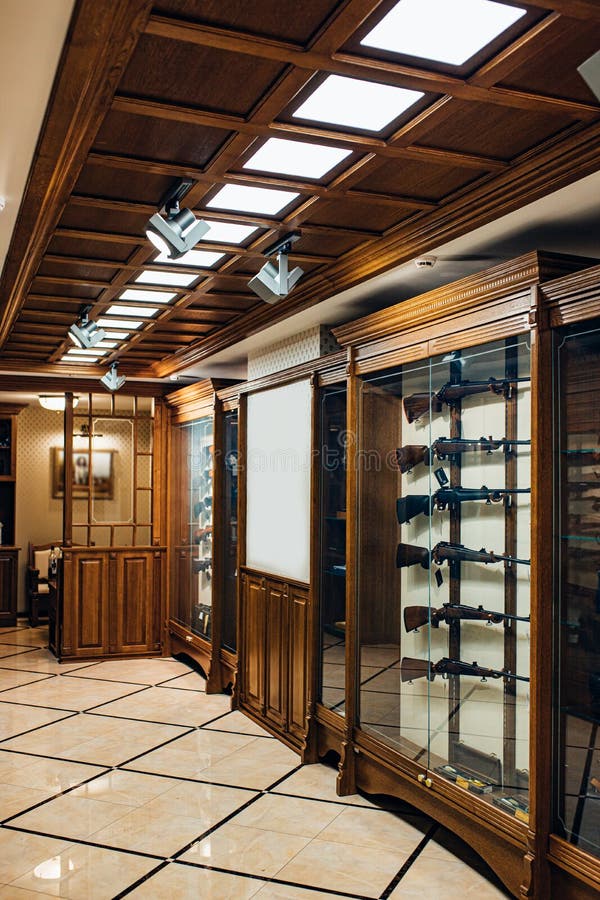 Modern Gun Store Interior with Different Rifles on Showcase Stock Photo ...