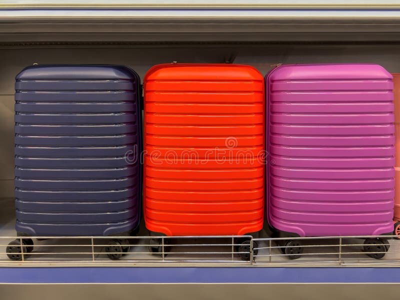 Modern Wheeled Suitcase in 3 Different Colors on Display on the Store ...