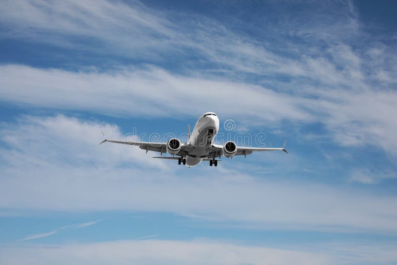 Modern White Airplane Flying in Cloudy Sky Stock Image - Image of speed ...